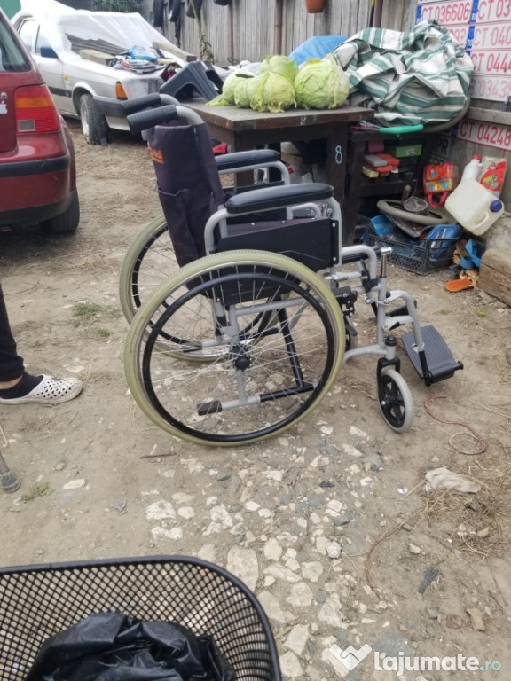 Carut cu rotile ptr persoane cu dizabilitati